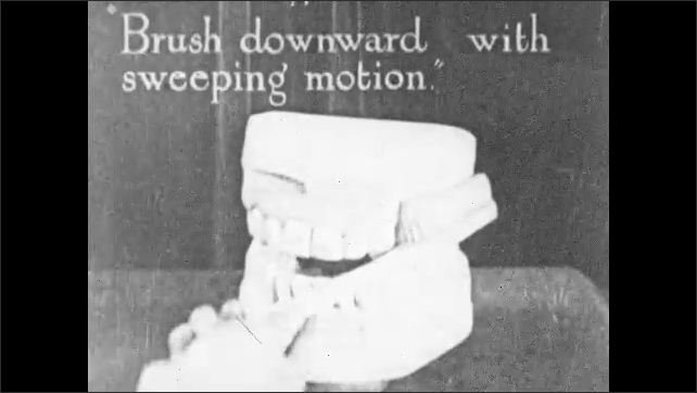 1930s: Students mimic tooth brushing. Nurse demonstrates how to brush ...
