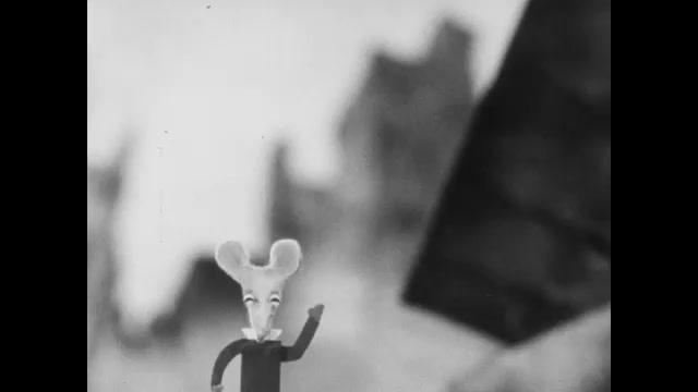1960s: Animation. Mouse waves. Train leaves station. Mother and ...