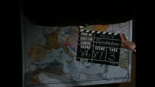 1960s: Film slate. Wall map of Europe. – Archival Footage