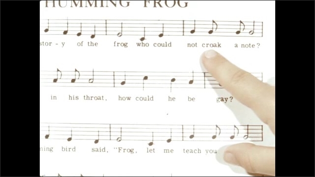 1950s: Close up shos of sheet music, hand points to notes. – Archival ...