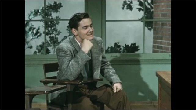1950s: student coming into classroom and giving teacher yearbook ...