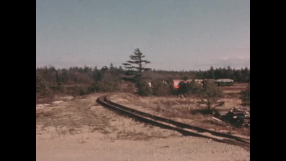 1960s: Old Colony railroad steam passenger train moves down track ...