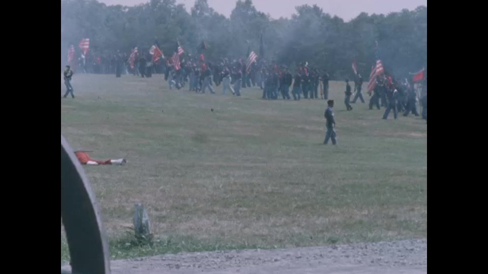 1960s: Soldiers on battlefield. Men fire weapons and walk. – Archival ...
