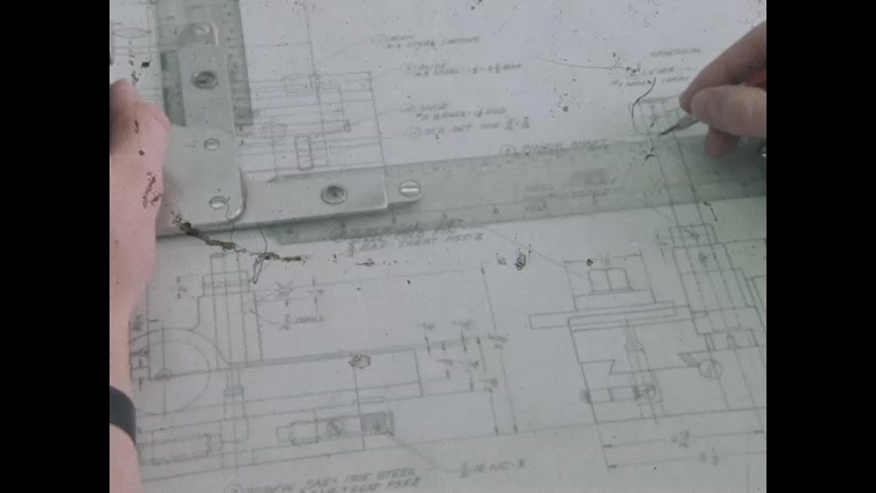 1960s: Hands use mechanical pencil to make lines on blueprint plans ...