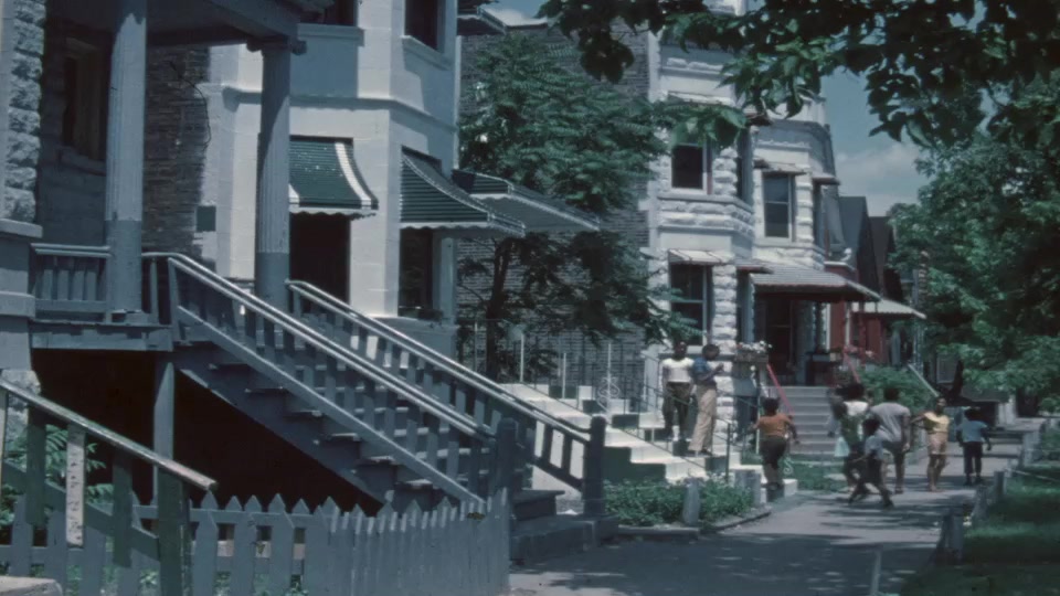 1960s: African American children play on sidewalks and stoop of ...