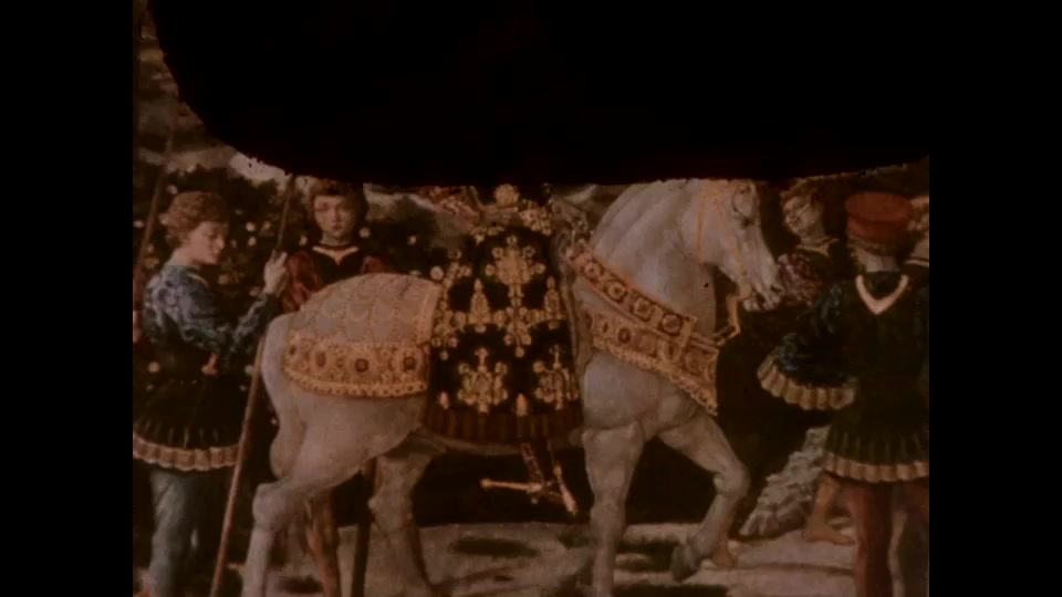 1950s: Men in medieval uniforms carry staves near king riding horse in ...