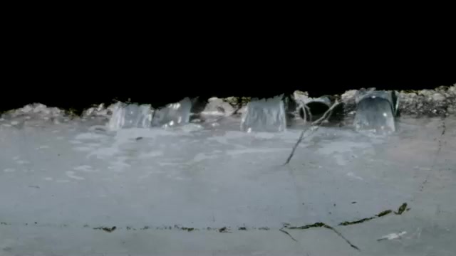 1960s: Water pouring from pipes. Water pouring from pipes into stream ...