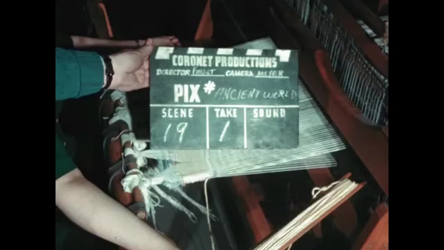 1940s: Woman sits at large loom and weaves. Mummified figure. Man in ...