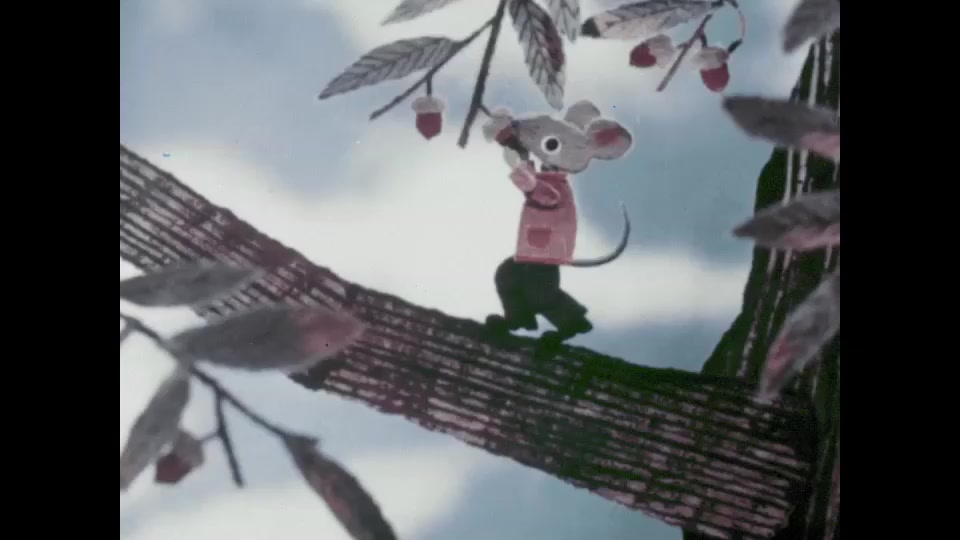 1960s: Animation, mouse pulling acorns from tree. Train pulling up to ...