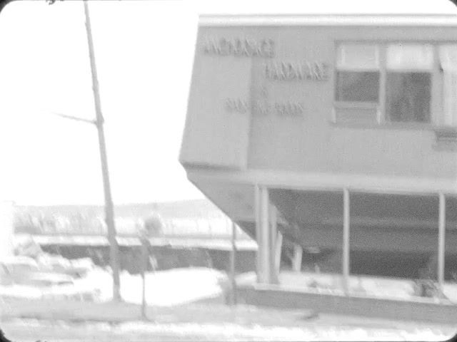 1960s: ALASKA: hardware store damaged in earthquake. View through shop ...