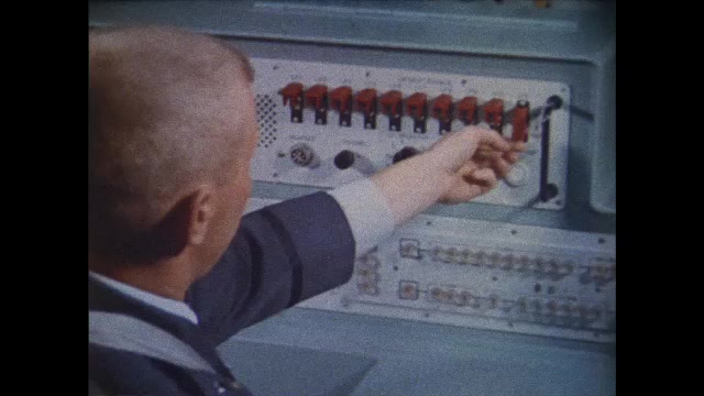 1960s:Missile explodes from underground silo. Workers help lower ...