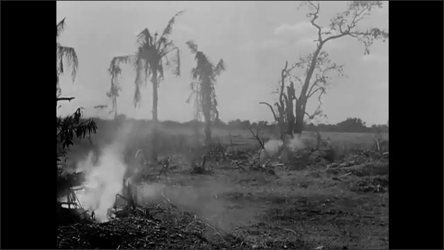 1940s: American and Japanese soldiers exchange artillery and small arms ...