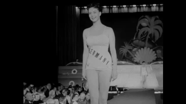 1950s: Women present themselves on stage in Miss Universe pageant ...