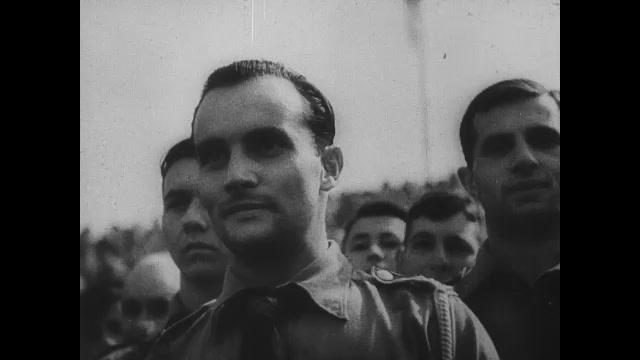 1930s: Soldiers, people in audience at Nazi rally at Nuremberg ...