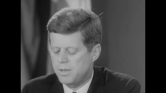 1960s: President John F. Kennedy delivering speech into microphones ...