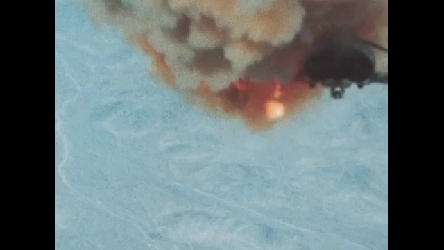 1960s: Missile falls through air and explodes. – Archival Footage