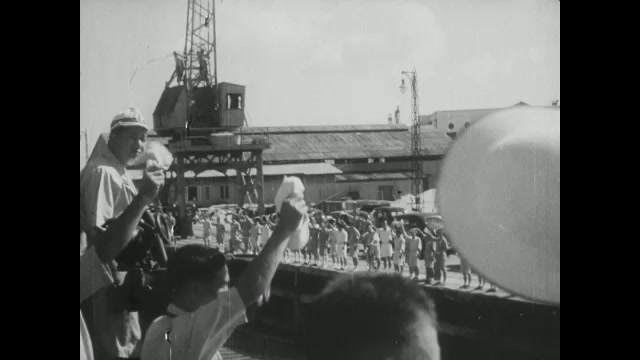 1940s: Japanese soldiers stand at attention, waving, on decks of ...