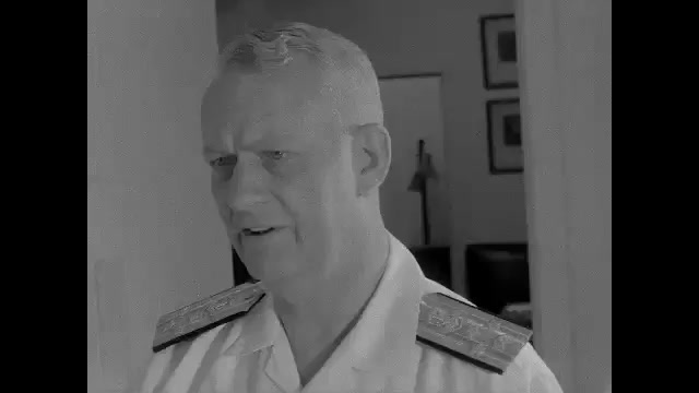 1940s: Navy officer talks. Other Navy officer talks. Two Navy officers ...