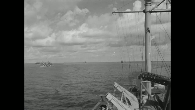 1940s: Amphibious boat approaches shore slowly. – Archival Footage