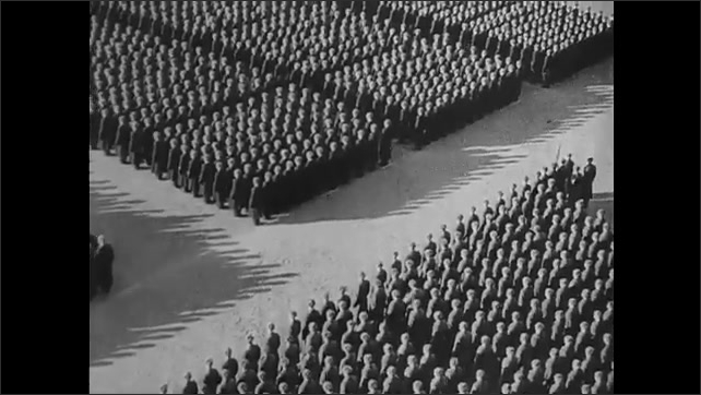 1940s: Joseph Stalin standing on balcony. Russian soldiers marching ...