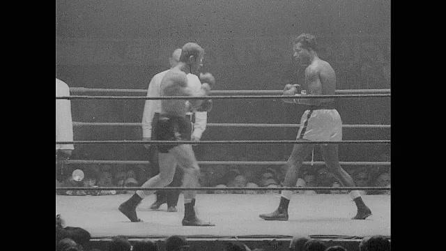 1960s: Sugar Ray Robinson competes in boxing match. Men smoke ...