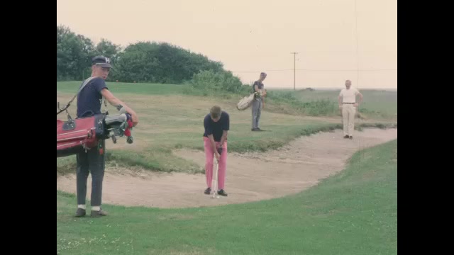 1960s: John F. Kennedy hits golf ball out of sand trap and onto green ...