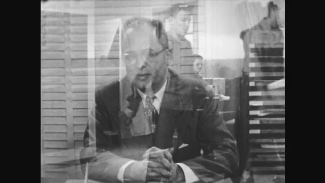 1950s: teen boy puts ballot in box and teen girl takes paper into ...
