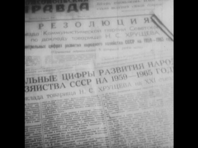 Russia: 1950s: Russian newspapers and headlines. Man passes papers ...