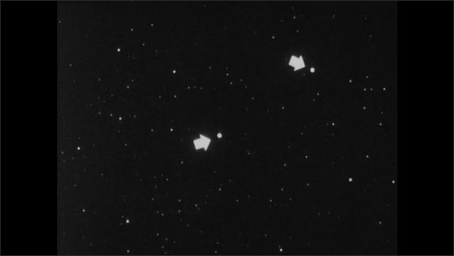 1950s: Space. Two arrows point to two different planets in space ...