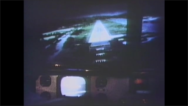 1960s: Pilot uses flight simulator to land aircraft. – Archival Footage