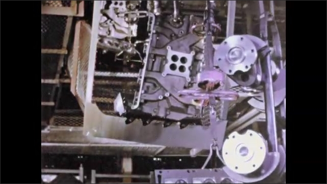 1960s: Factory, man works at control panel, knobs, gauges. Hanging ...