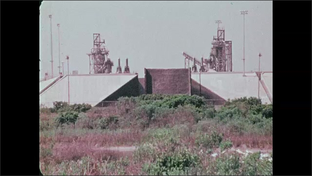 1960s: Blast shielding and fences surround launch pad and space center ...