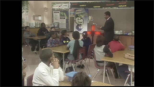 2000s: traffic light turns from red to green, cars drive through ...