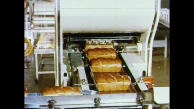 1950s: Loaves of bread travel down slide, move along conveyor belts to ...